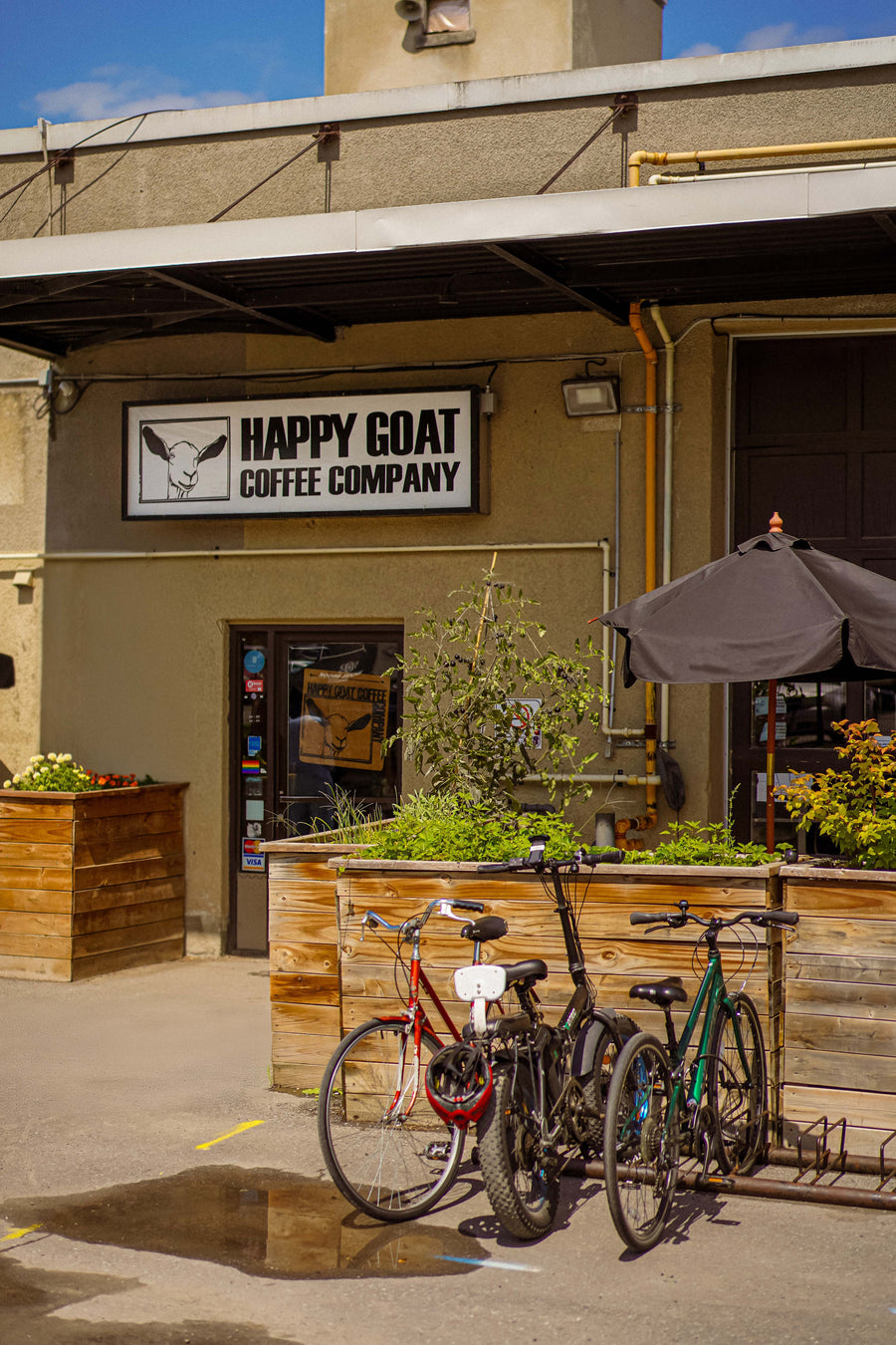 Our Cafes – Happy Goat Coffee